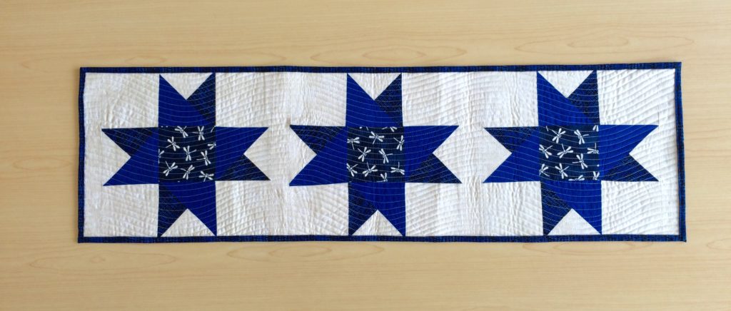 Spinning Star Finished - Quilting in the Fog